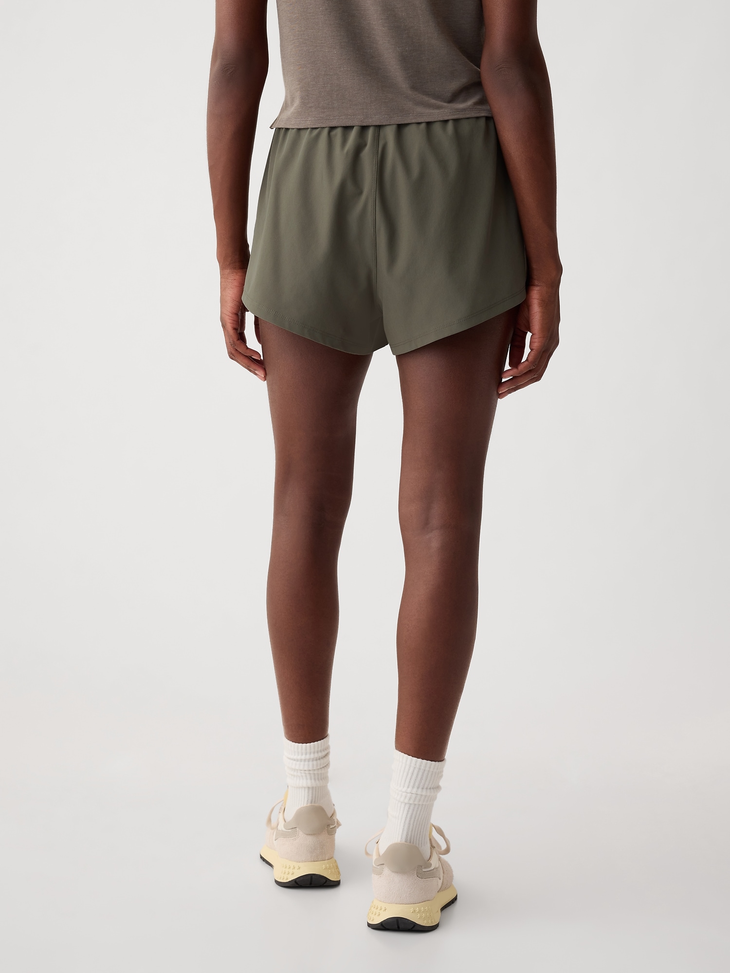 GapFit Mid Rise Dolphin Running Shorts | Gap